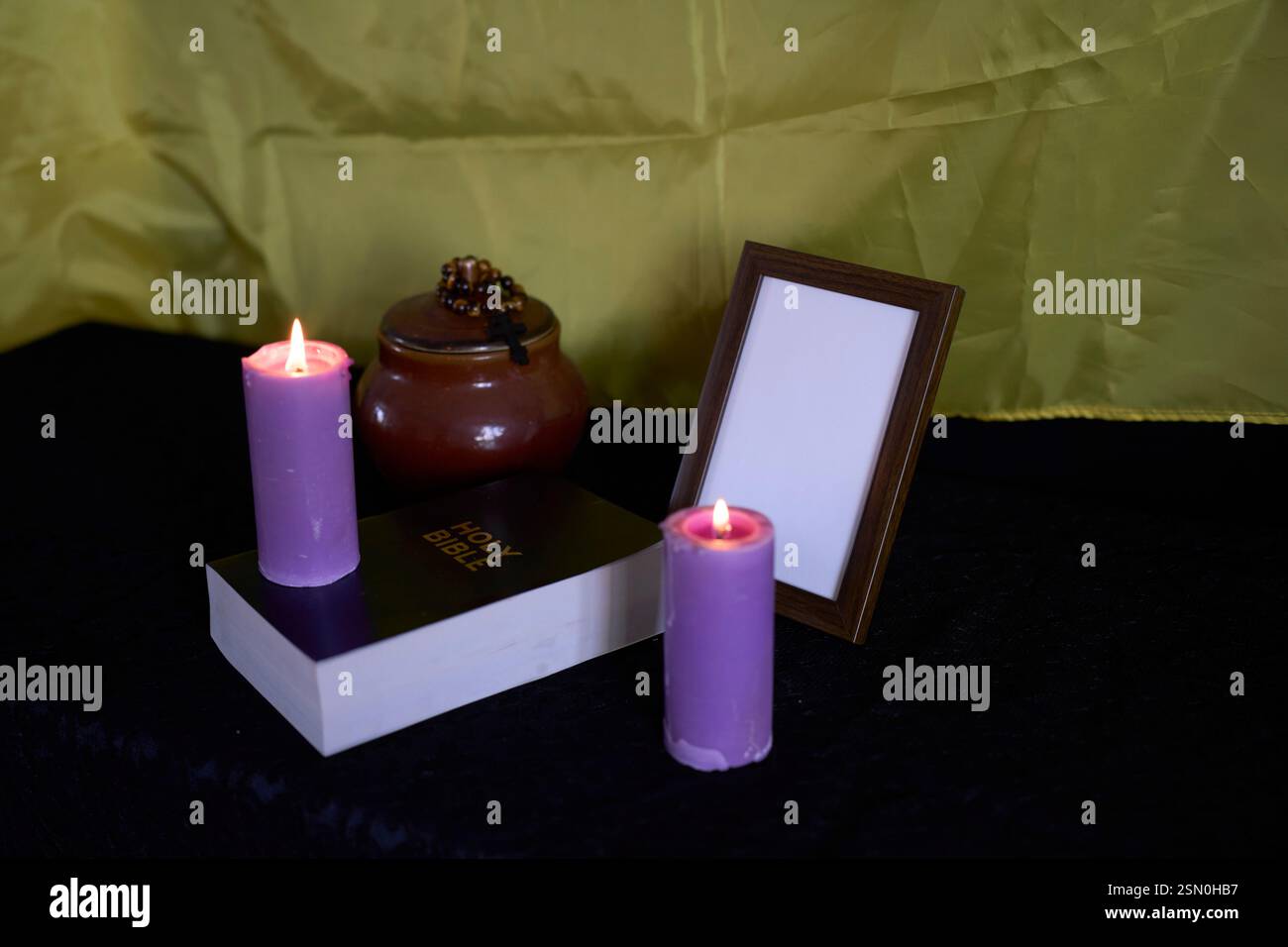 funeral of Ukrainian , photo frame, candles, marble urn for ashes, holy ...