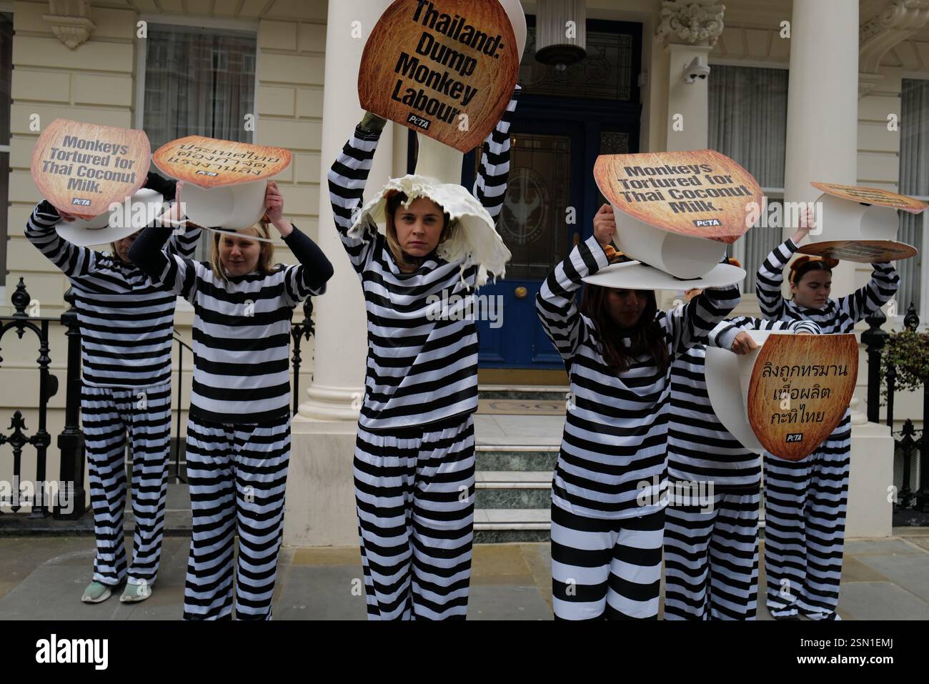 Activists from PETA stage a dramatic protest outside the Royal Thai ...