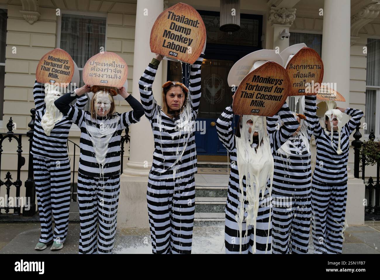 Activists from PETA stage a dramatic protest outside the Royal Thai ...