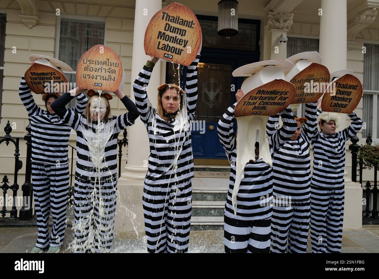 Activists from PETA stage a dramatic protest outside the Royal Thai ...