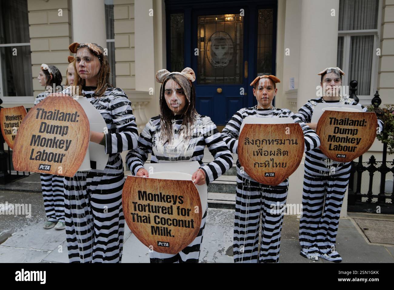 Activists from PETA stage a dramatic protest outside the Royal Thai ...