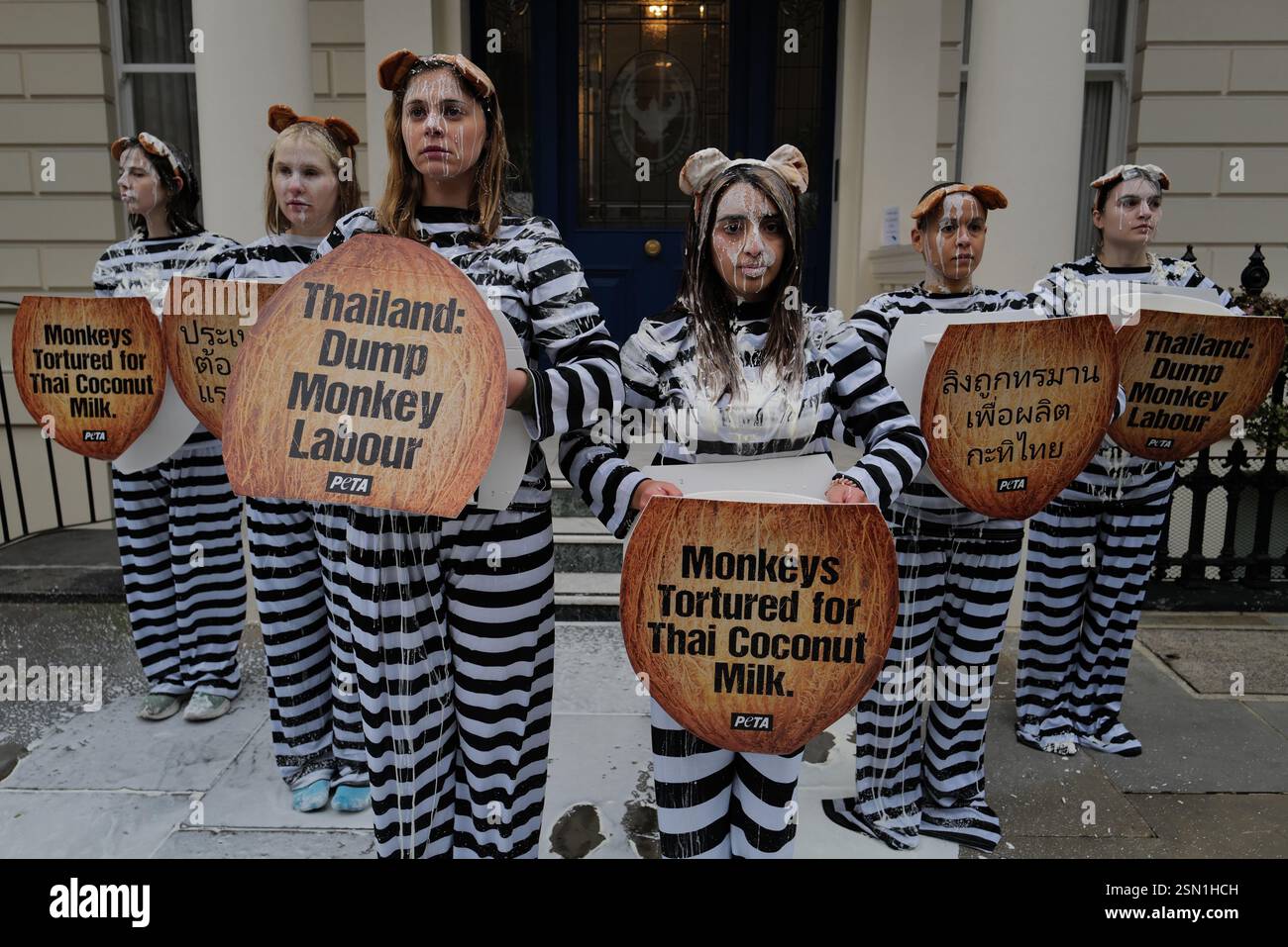Activists from PETA stage a dramatic protest outside the Royal Thai ...