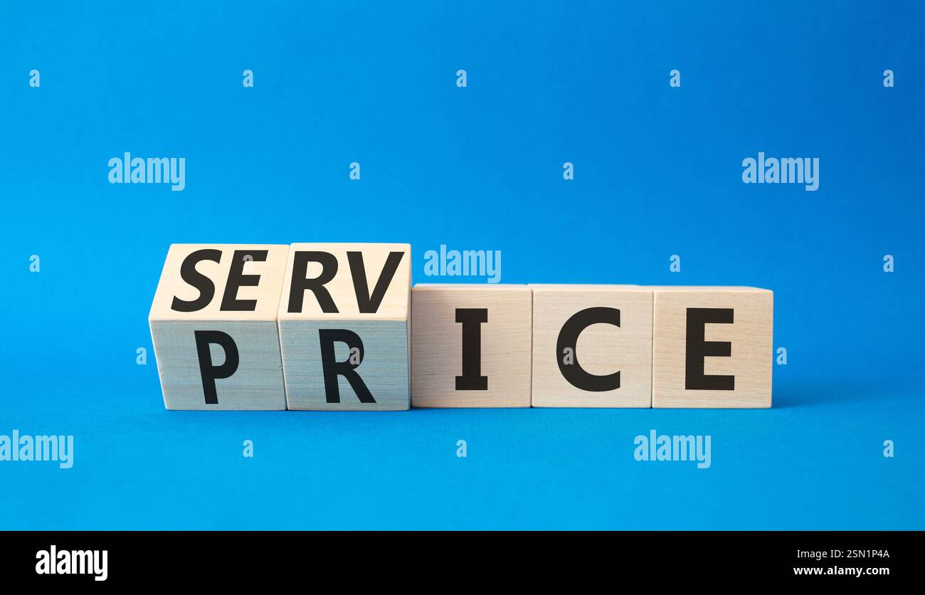 Service and price symbol. Turned wooden cubes with words service and ...