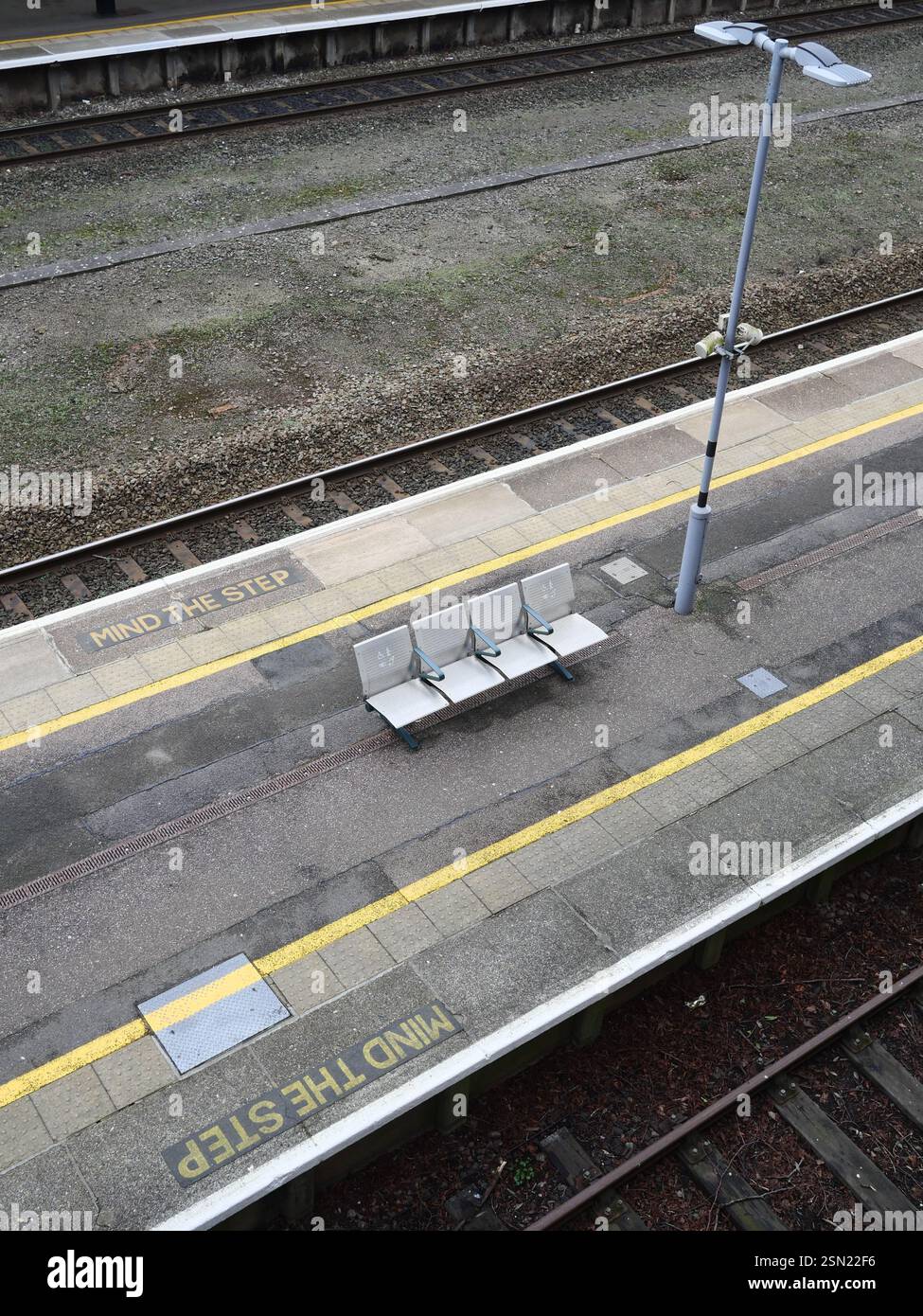 Overhead view of empty train station platform with no people and no ...