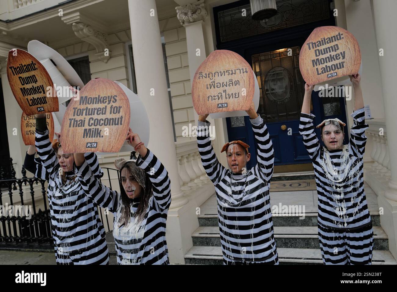 Activists from PETA stage a dramatic protest outside the Royal Thai ...