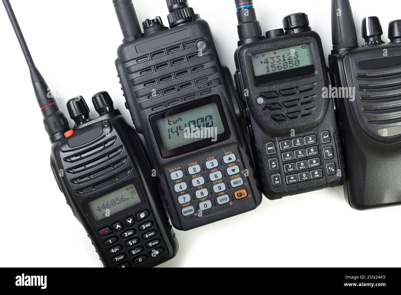 Various models of two-way radio communication devices on a white ...