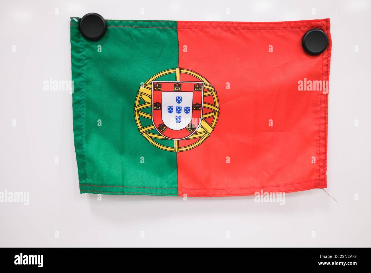 Flag of Portugal with magnets on a white board Stock Photo - Alamy