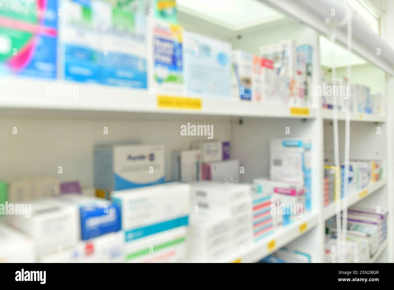 Medicine on shelves in Pharmacy interior with blurred background Stock ...