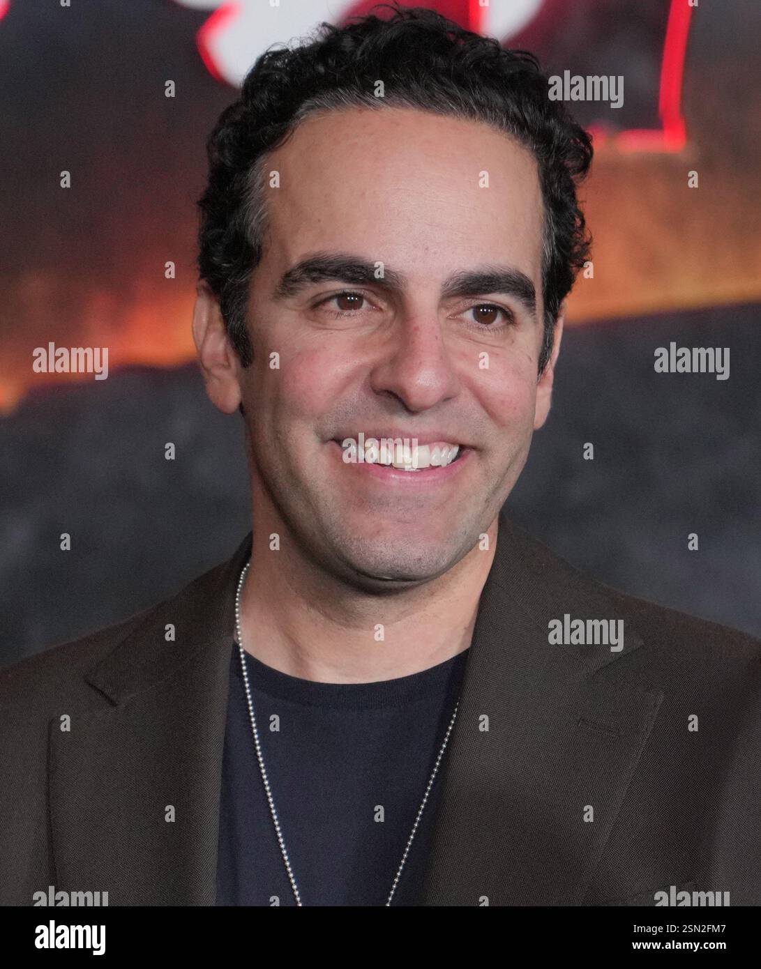 Los Angeles, USA. 12th Feb, 2025. Dan Ahdoot arrives at Netflix's COBRA ...