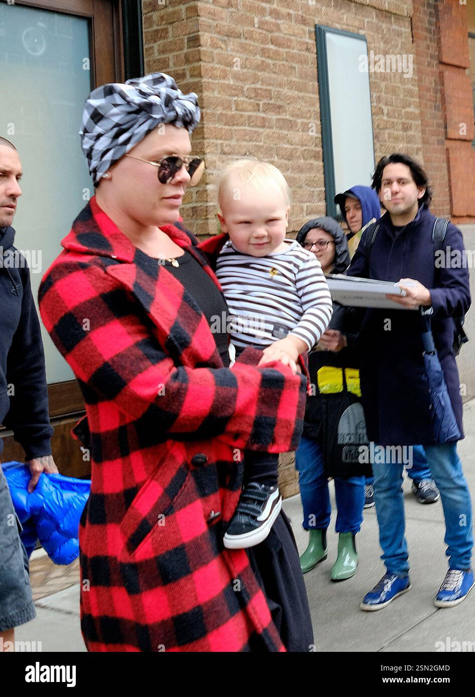Singer Pink leaves a downtown hotel with her son Jameson Moon Hart and ...