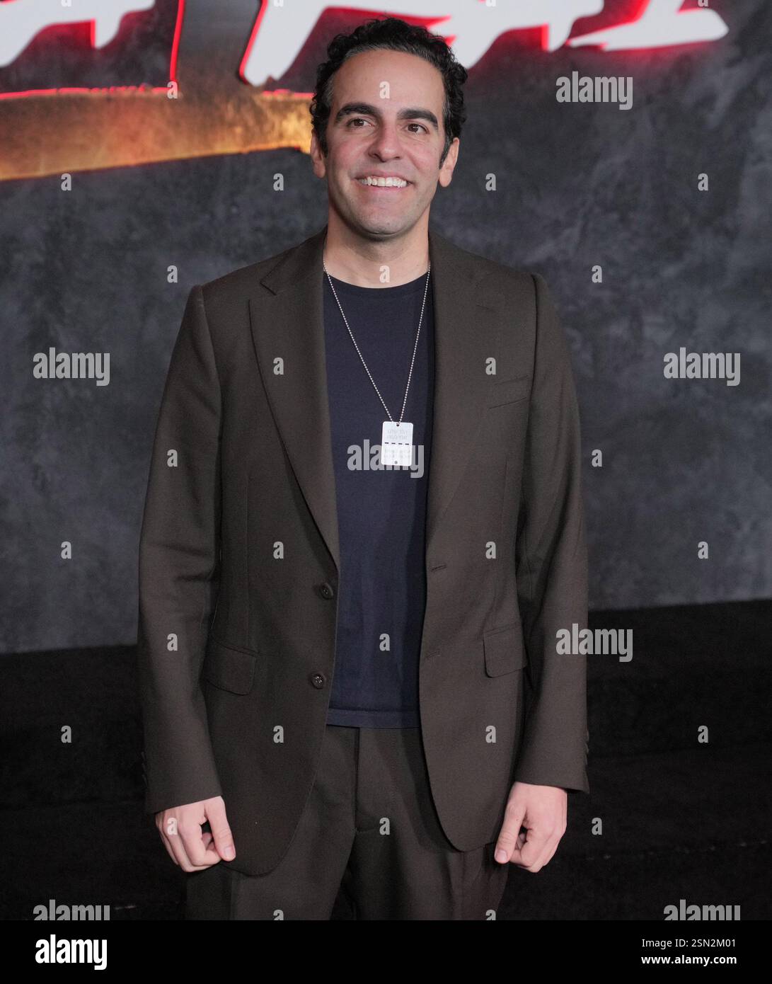 Los Angeles, USA. 12th Feb, 2025. Dan Ahdoot arrives at Netflix's COBRA ...