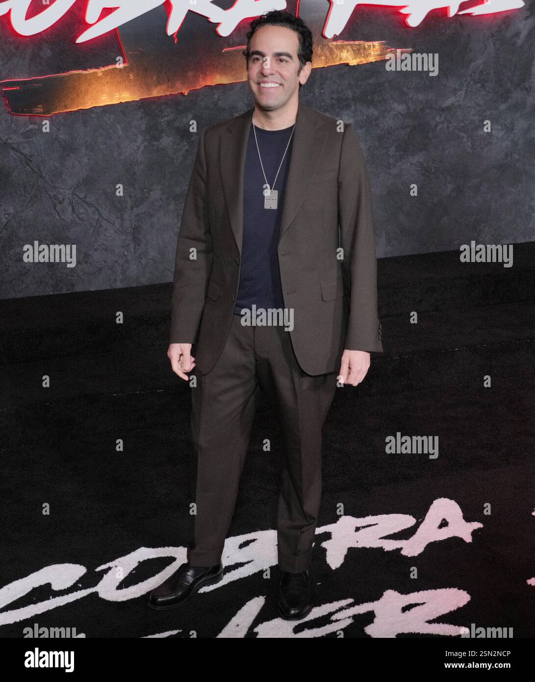 Los Angeles, USA. 12th Feb, 2025. Dan Ahdoot arrives at Netflix's COBRA ...