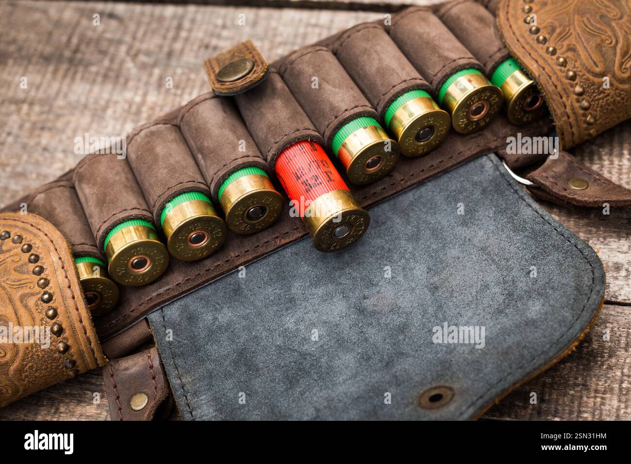 Detailed view of a leather shotgun shell holder showcasing various ...