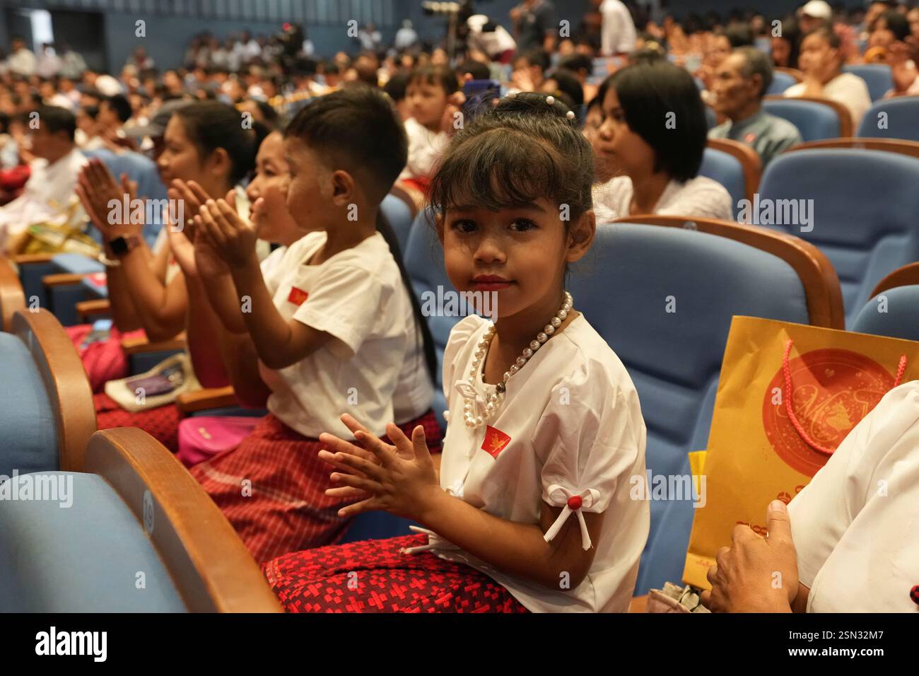Ethnic Mon people with traditional attire watch performances during a ...