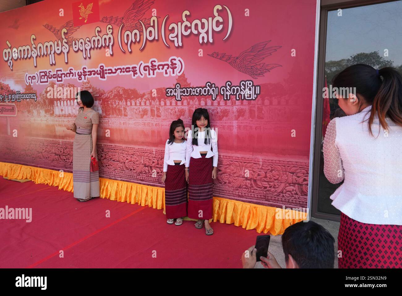 Ethnic Mon people with traditional attire gather during a ceremony to ...