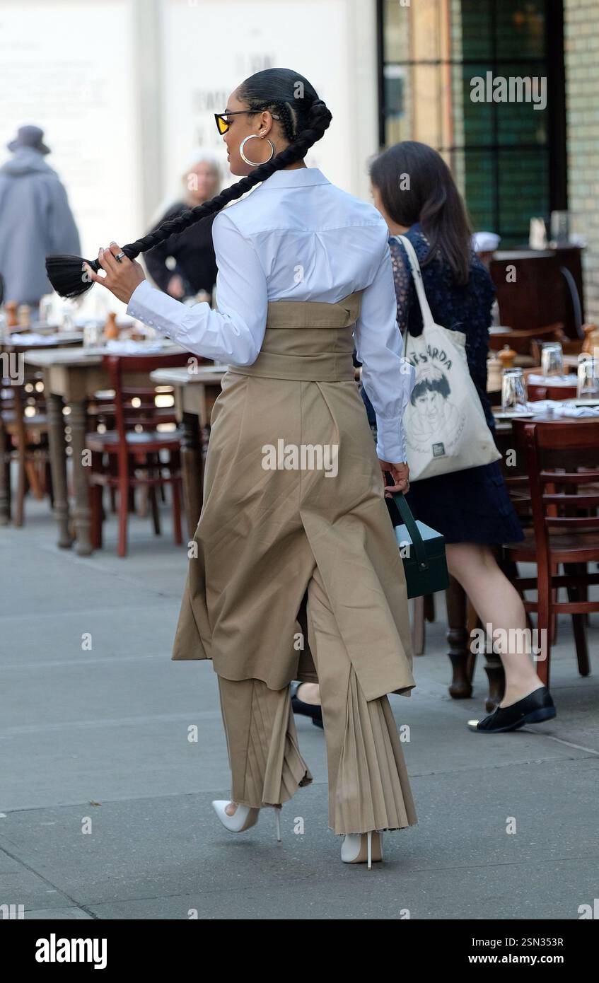 Actress Tessa Thompson wears an unusual dress and pants combination as ...