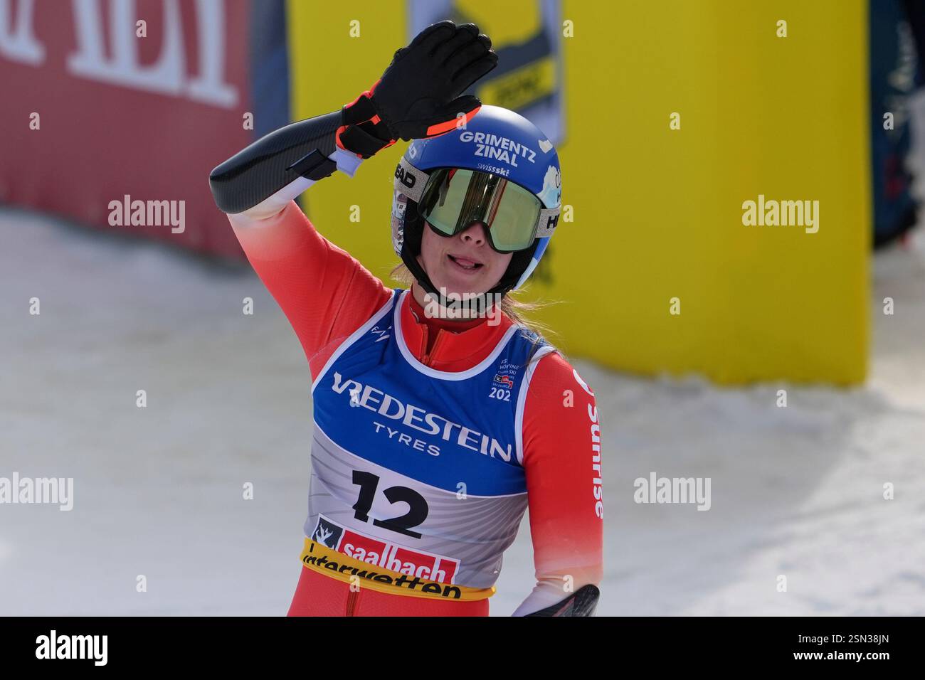 Switzerland's Camille Rast waves at the finish area of a women's giant ...