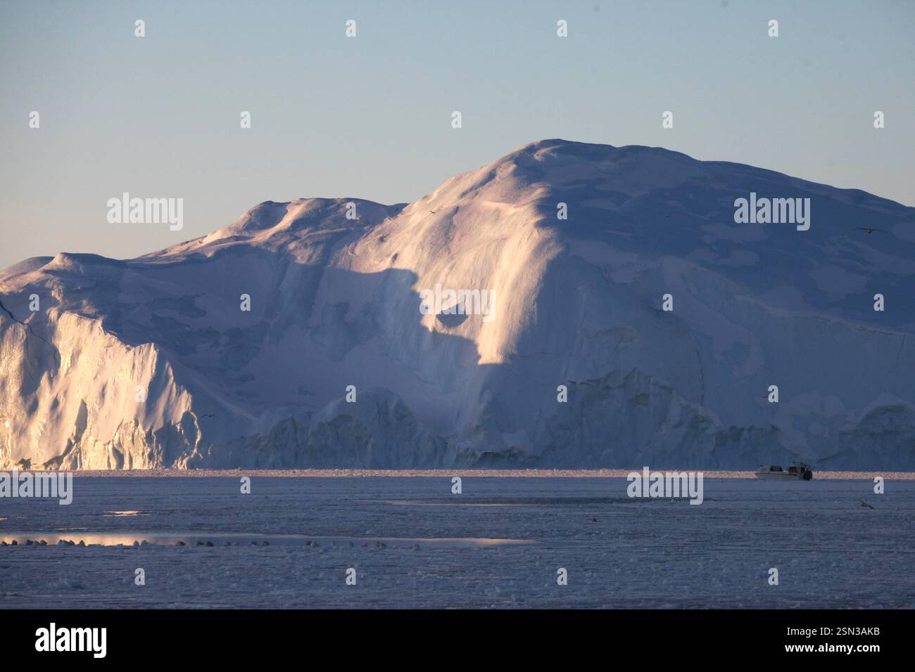 Ilulissat, Greenland. 07th Feb, 2025. Icebergs rise up in the Ilulissat ...