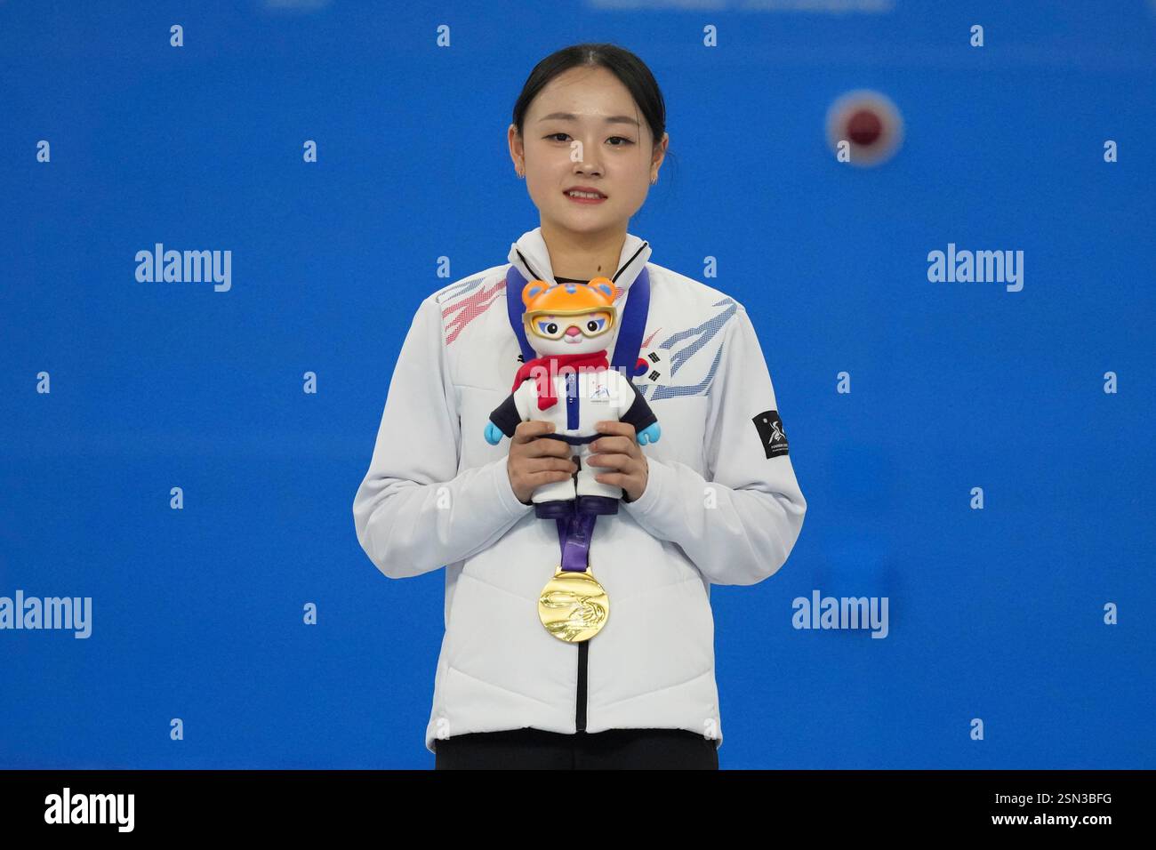 Gold medalist South Korea's Kim Chae-yeon celebrates on the podium ...