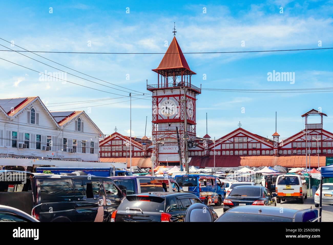 The photo captures the bustling scene outside Stabroek Market in ...