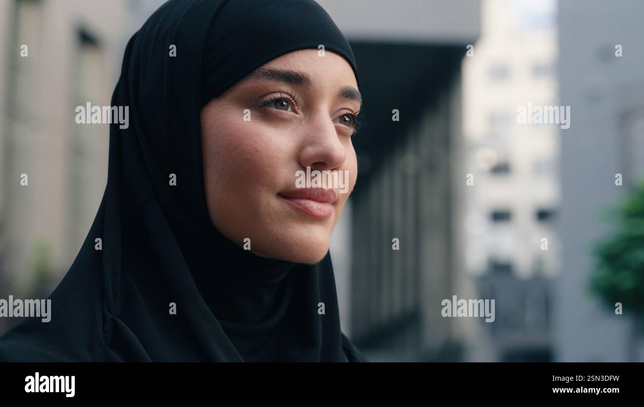 Portrait smiling cute pretty feminine attractive Muslim woman in hijab ...