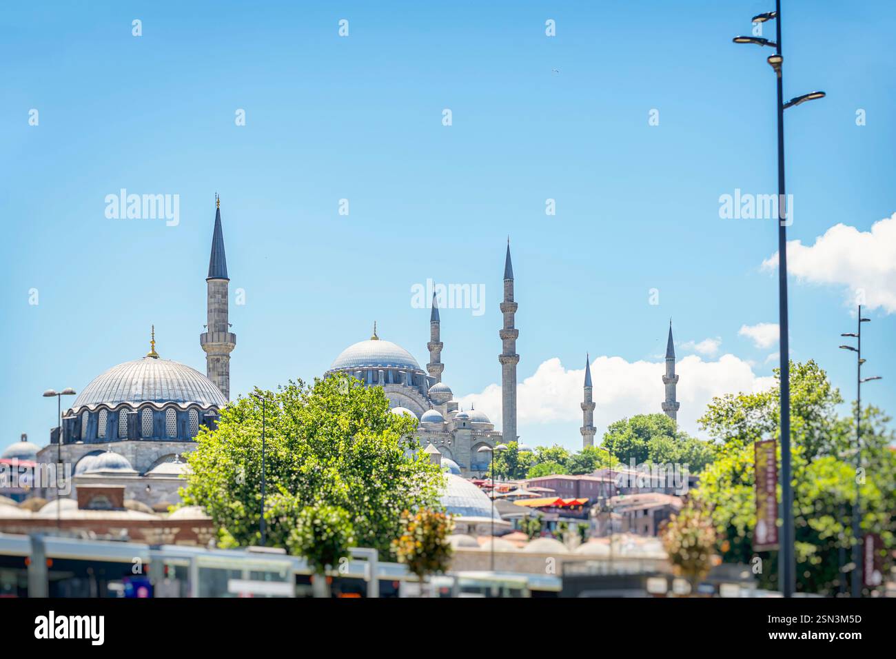 Blue Mosque. Scenic view of Istanbul's skyline with historic mosques and minarets. Greenery and ...
