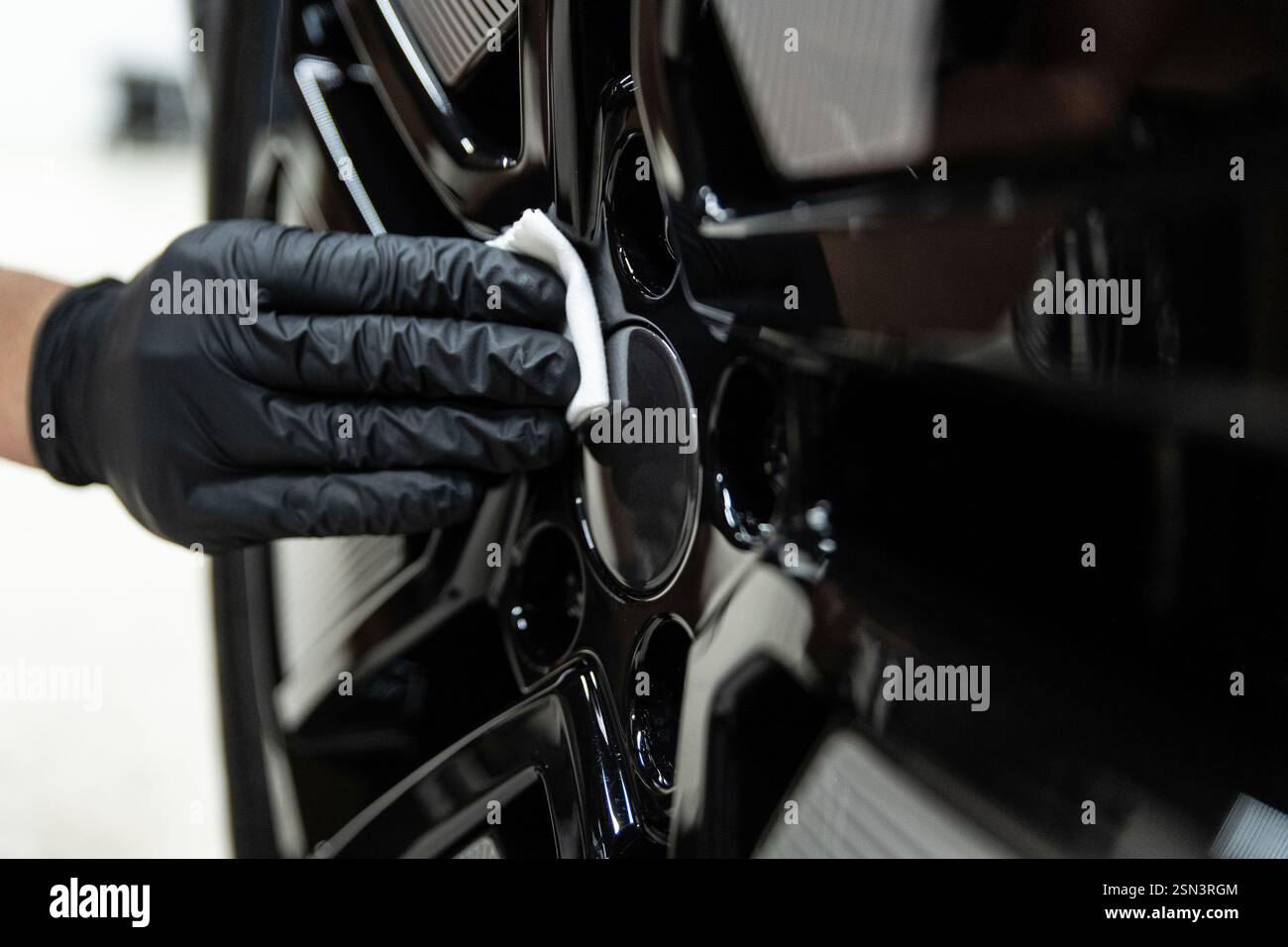 Ceramic protective coating applied on the car rim ensures a high-gloss ...