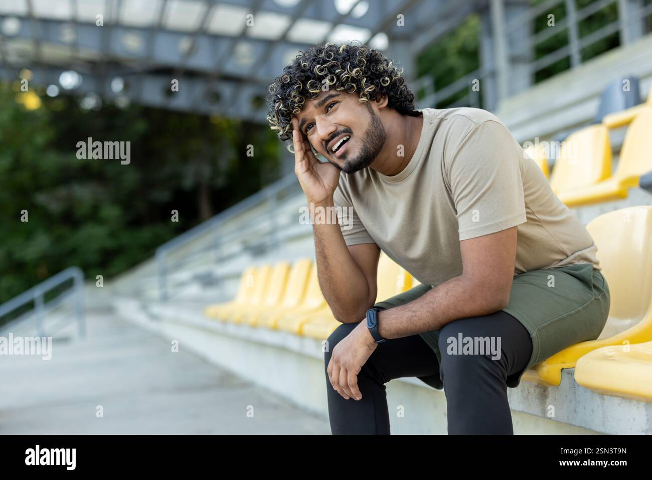Tired man resting after exhausting training, active physical exercises ...