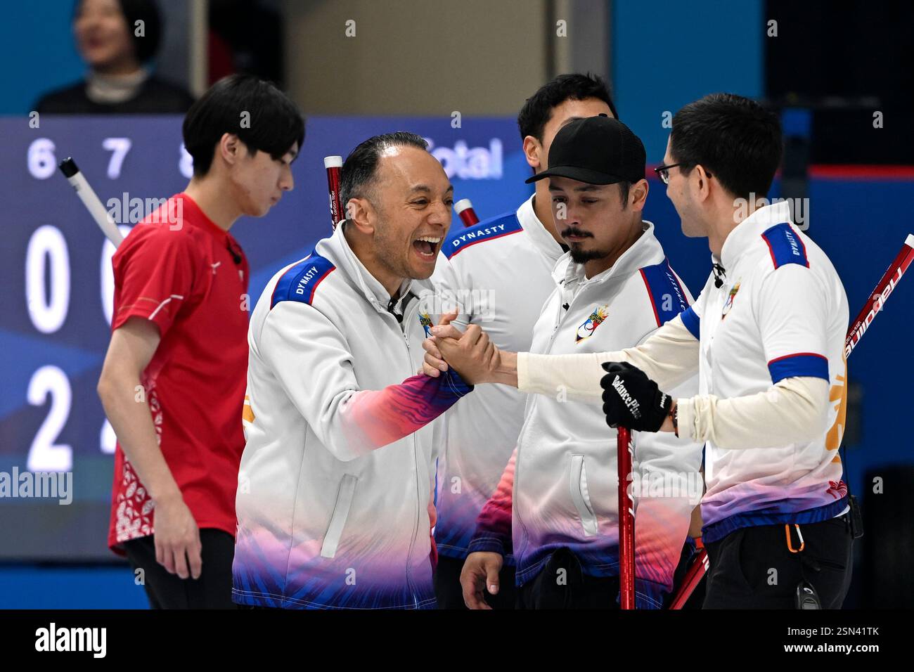 Harbin, China's Heilongjiang Province. 13th Feb, 2025. Alan Frei (2nd L ...