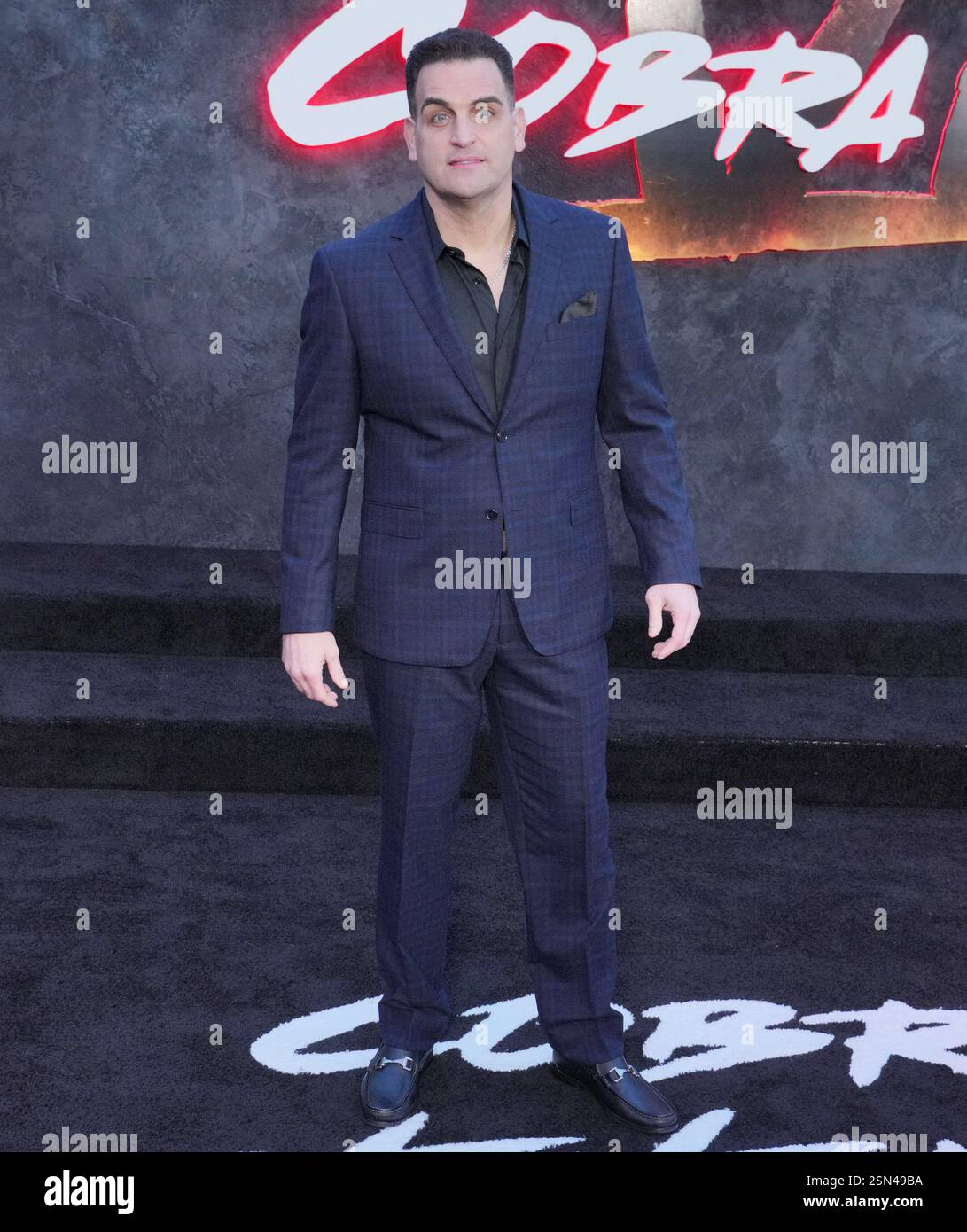 Los Angeles, USA. 12th Feb, 2025. Bret Ernst arrives at Netflix's COBRA ...