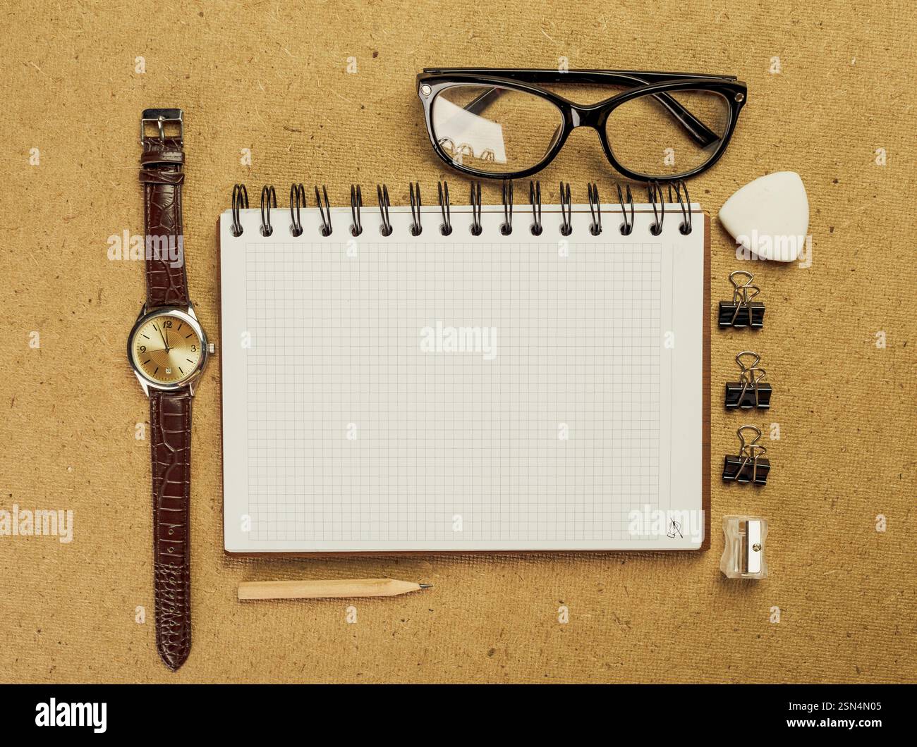 Items placed neatly on a desk for organizing notes and planning tasks ...