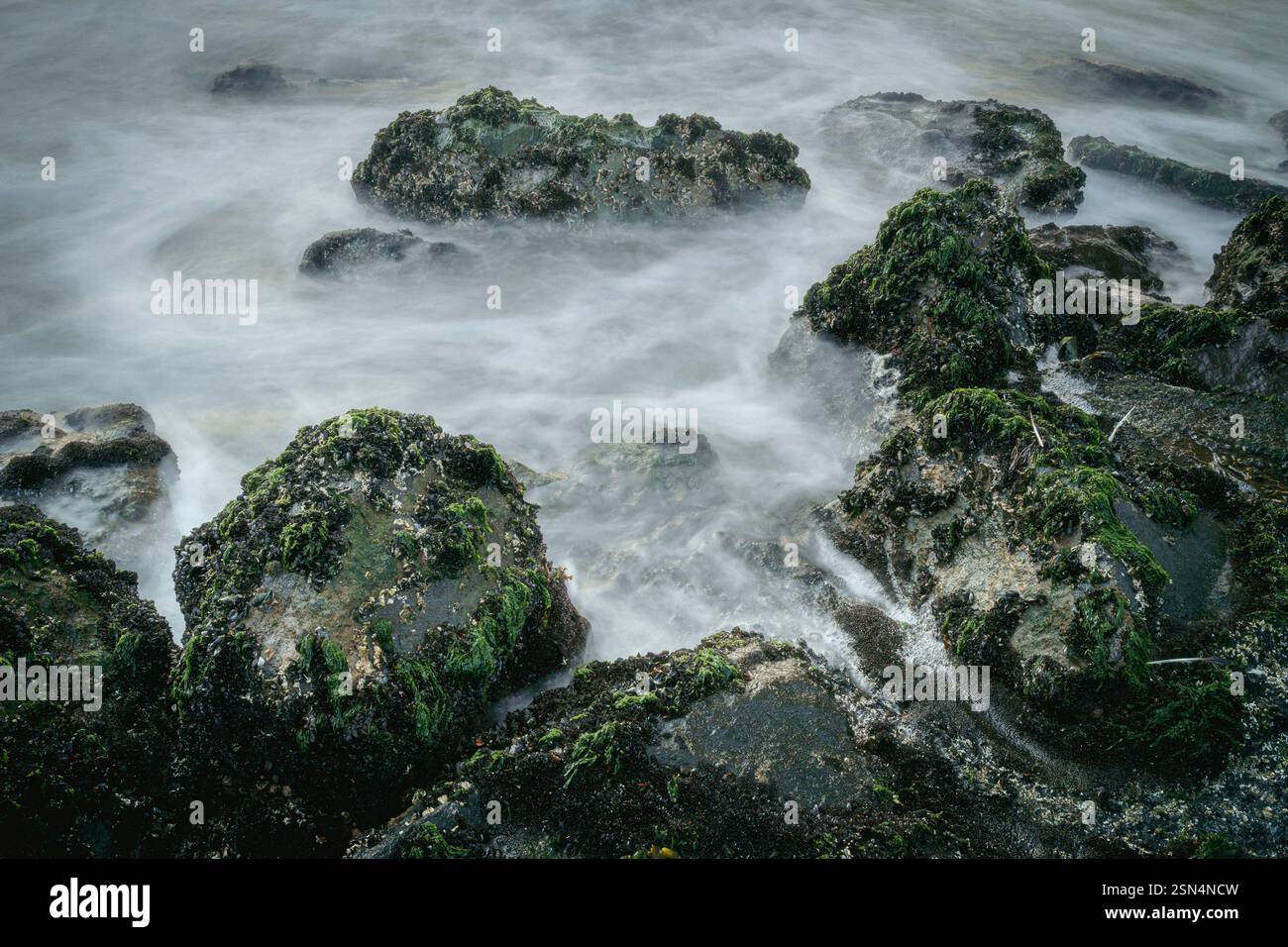 Coast movement, white wave crashing rock top, view wave long exposure ...