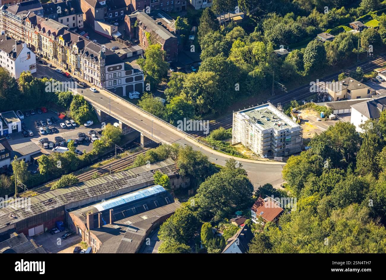 Aerial view, construction site with new building at the bridge Heegerstraße, residential area ...