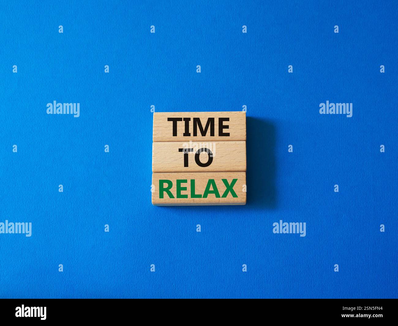 Time to relax symbol. Concept word Time to relax on wooden blocks ...