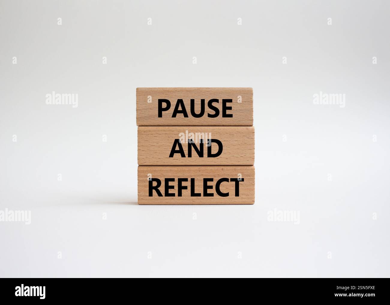 Pause and Reflect symbol. Concept words Pause and Reflect on wooden ...