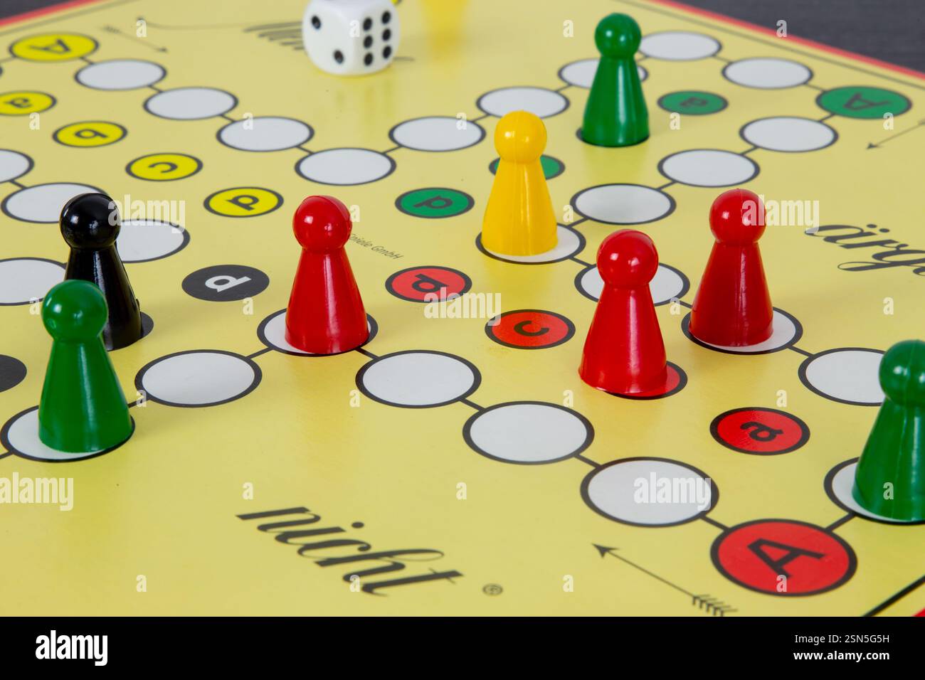 Close-up of the German board game MENSCH ÄRGERE DICH NICHT Stock Photo ...