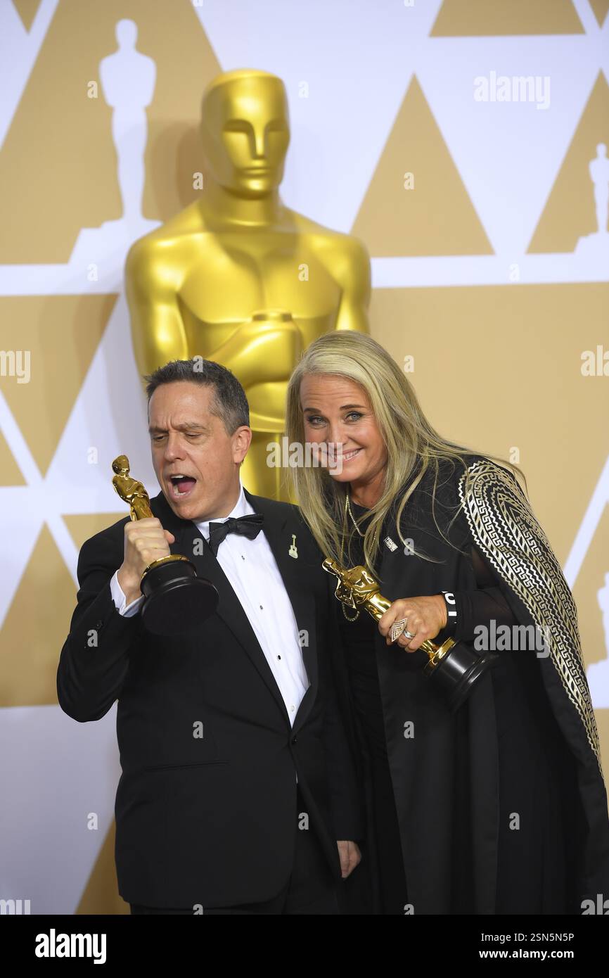 Director Lee Unkrich (L) and Producer Darla K. Anderson, winners of the ...