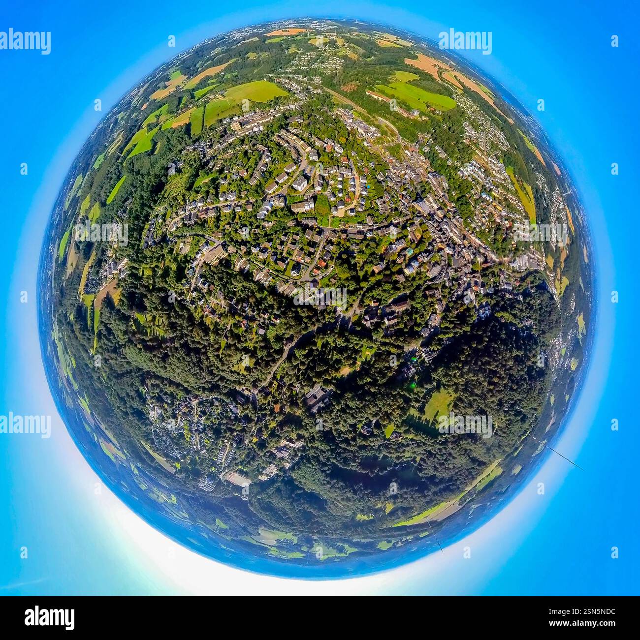 Aerial view, residential area, view of town center and forest area ...