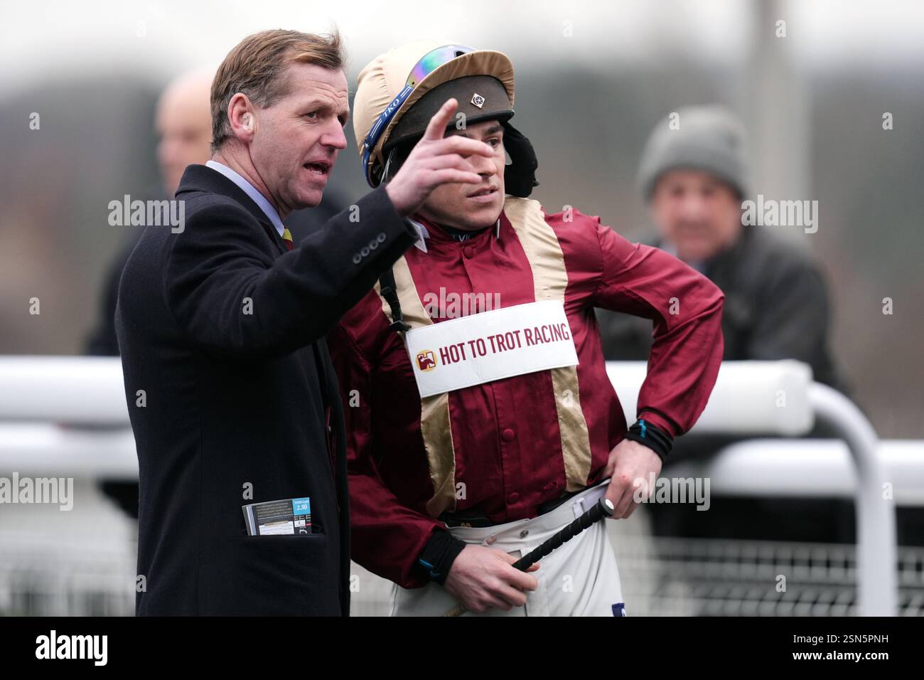 Trainer Jamie Snowden with jockey Gavin Sheehan at Sandown Racecourse ...