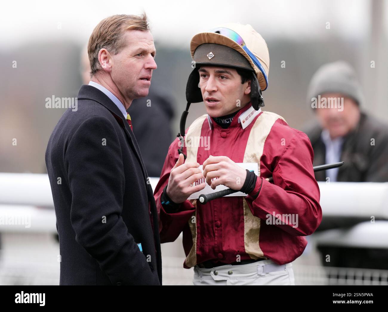 Trainer Jamie Snowden with jockey Gavin Sheehan at Sandown Racecourse ...