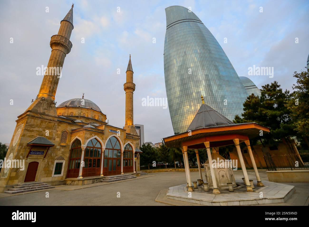 Turkish Mosque and Flame Towers inn Baku city Stock Photo - Alamy