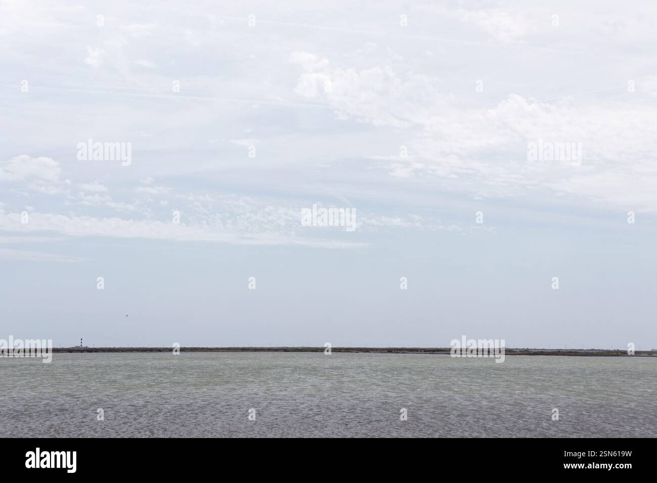 Minimalistic picture of a brackish water basin with lighthouse in the ...