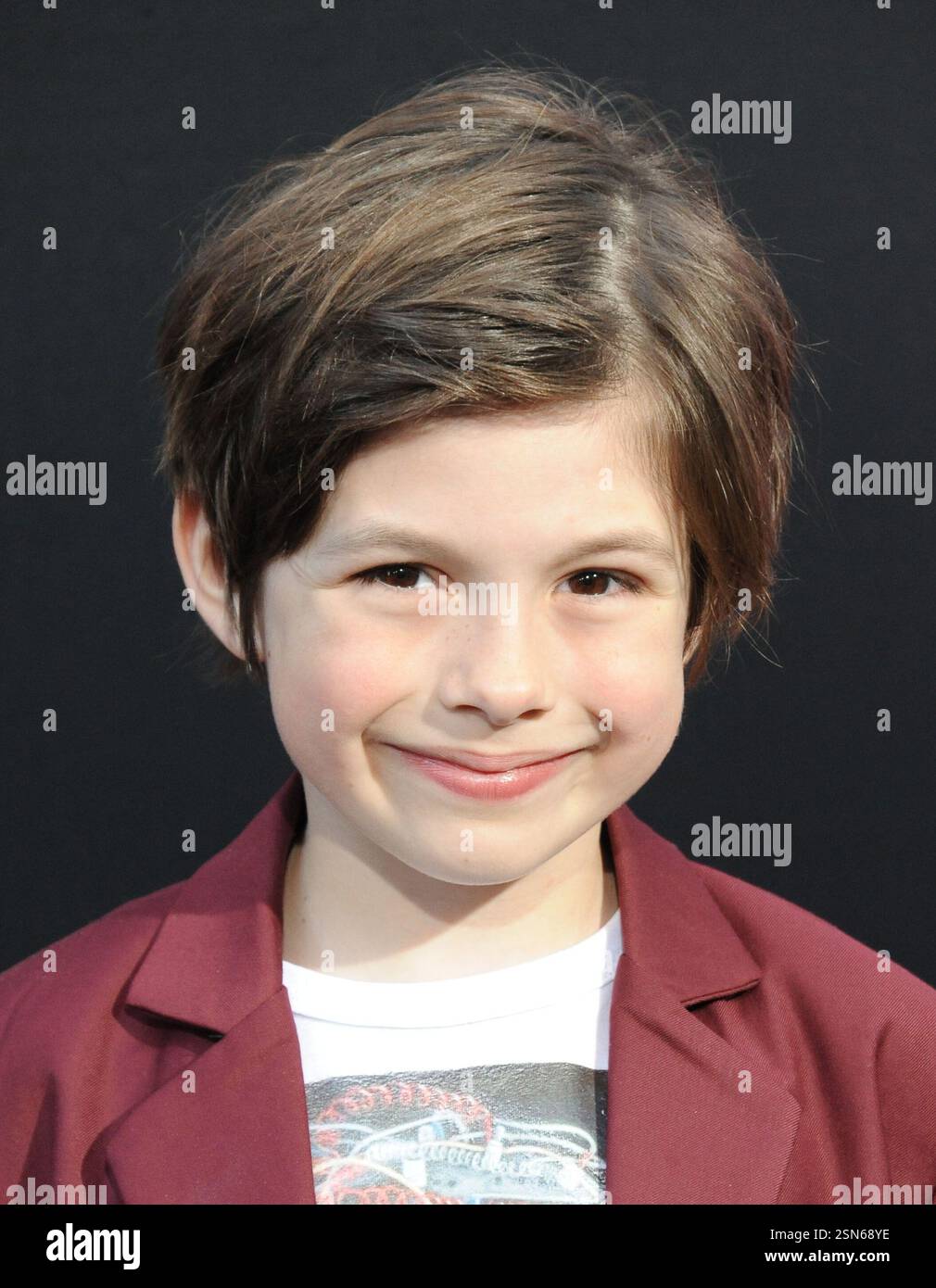 Asher Miles Fallica arriving at the premiere of 'Tully' at the Regal LA ...