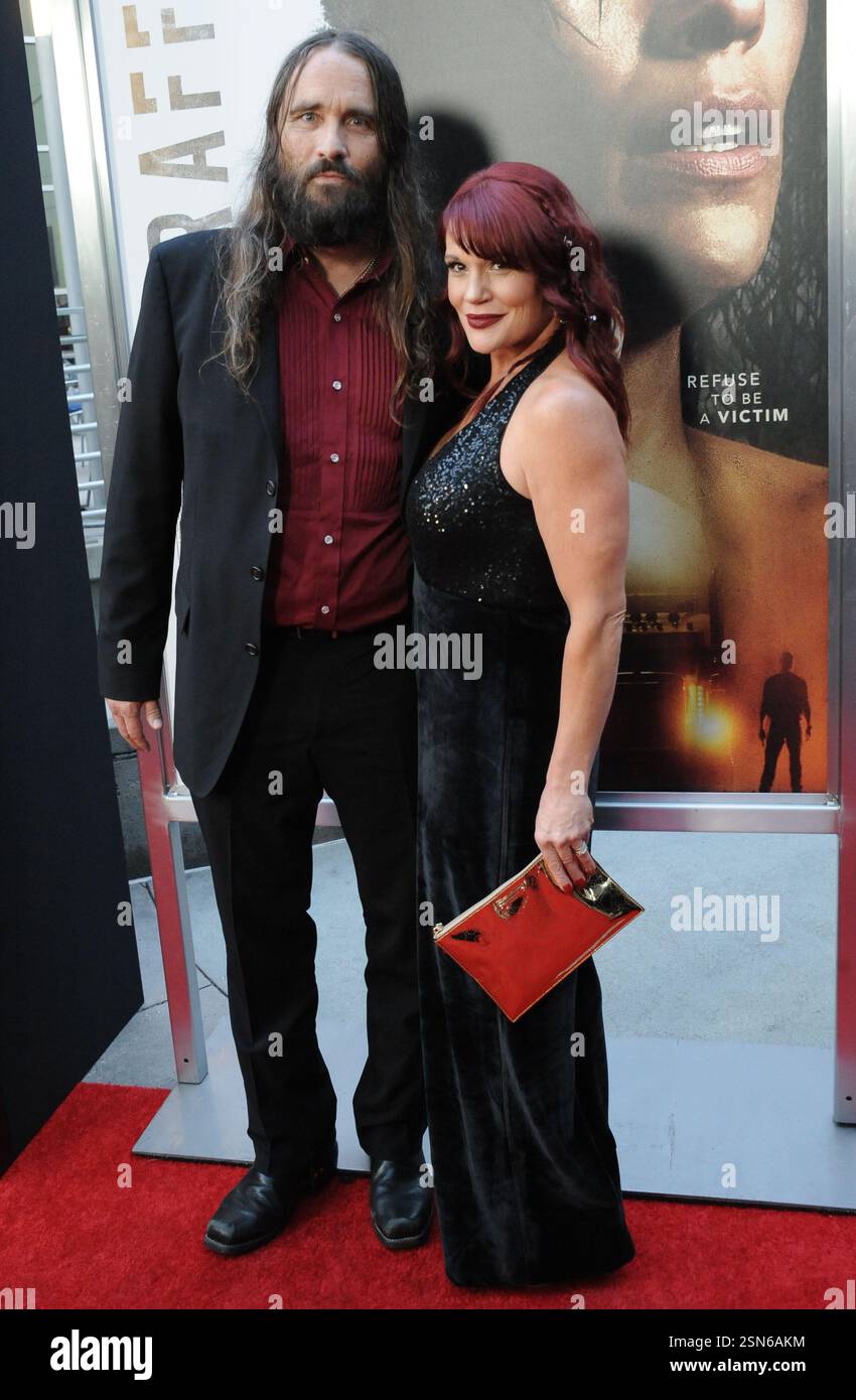 Actor Lorin McCraley (L) and guest arriving at the premiere of 'Traffik ...