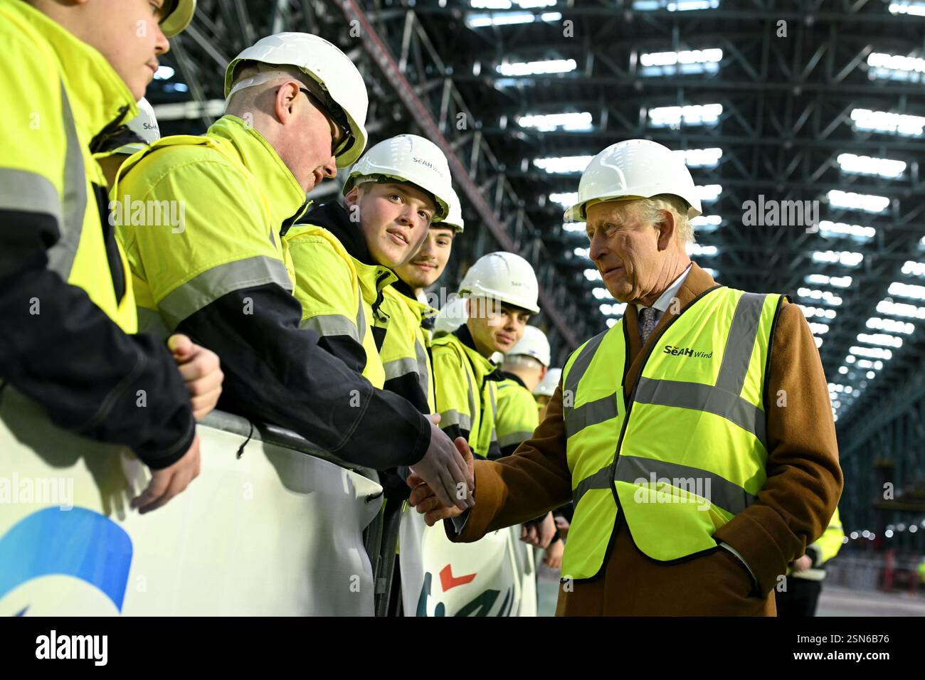 King Charles III meets workers and apprentices during a visit to SeAH ...