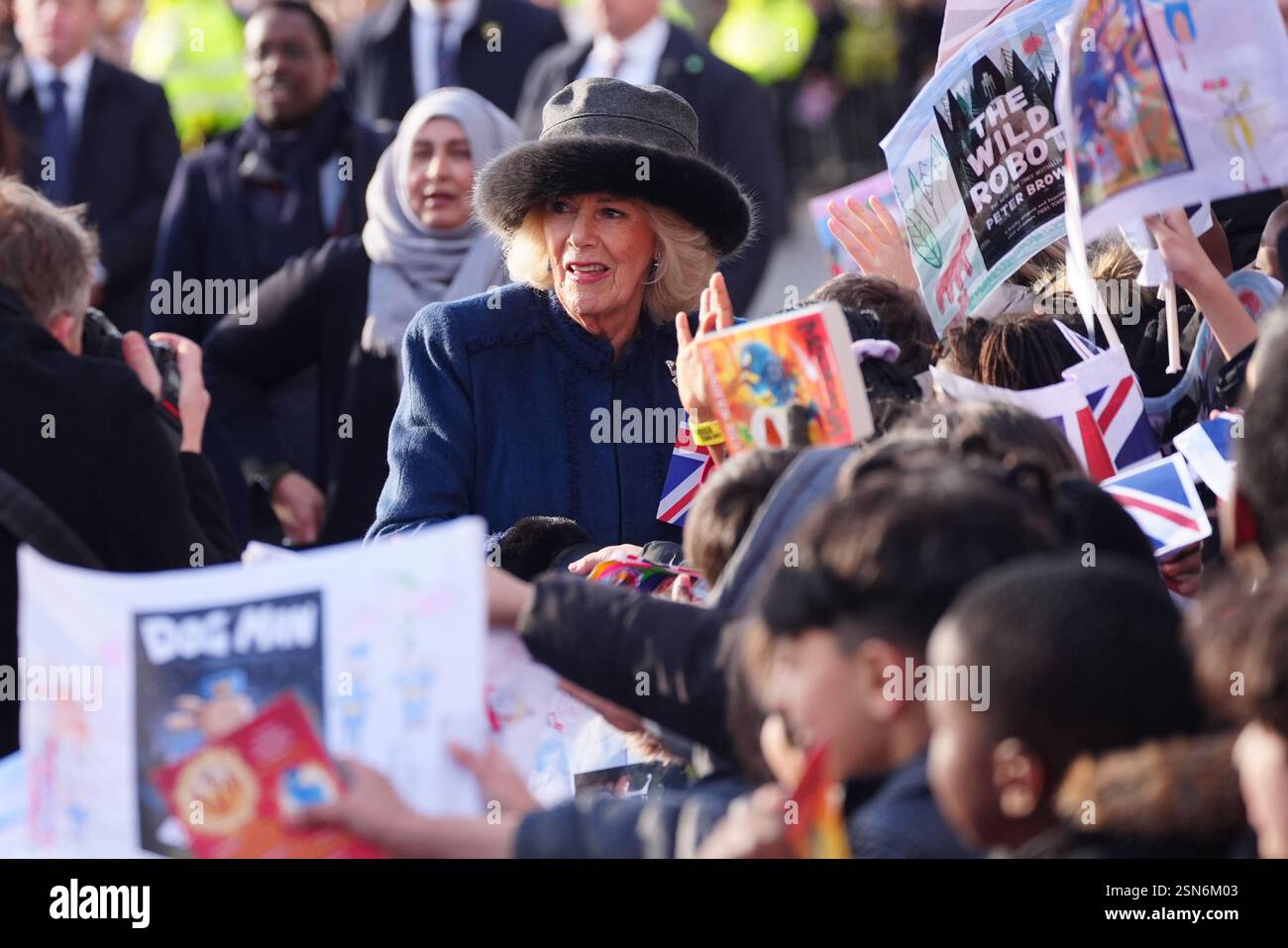 Queen Camilla meets members of the public and local dignitaries as she ...
