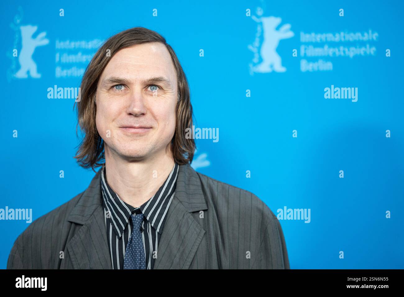 Berlin, Germany. 13th Feb, 2025. Lars Eidinger, actor and cast of the film "The Light", takes ...