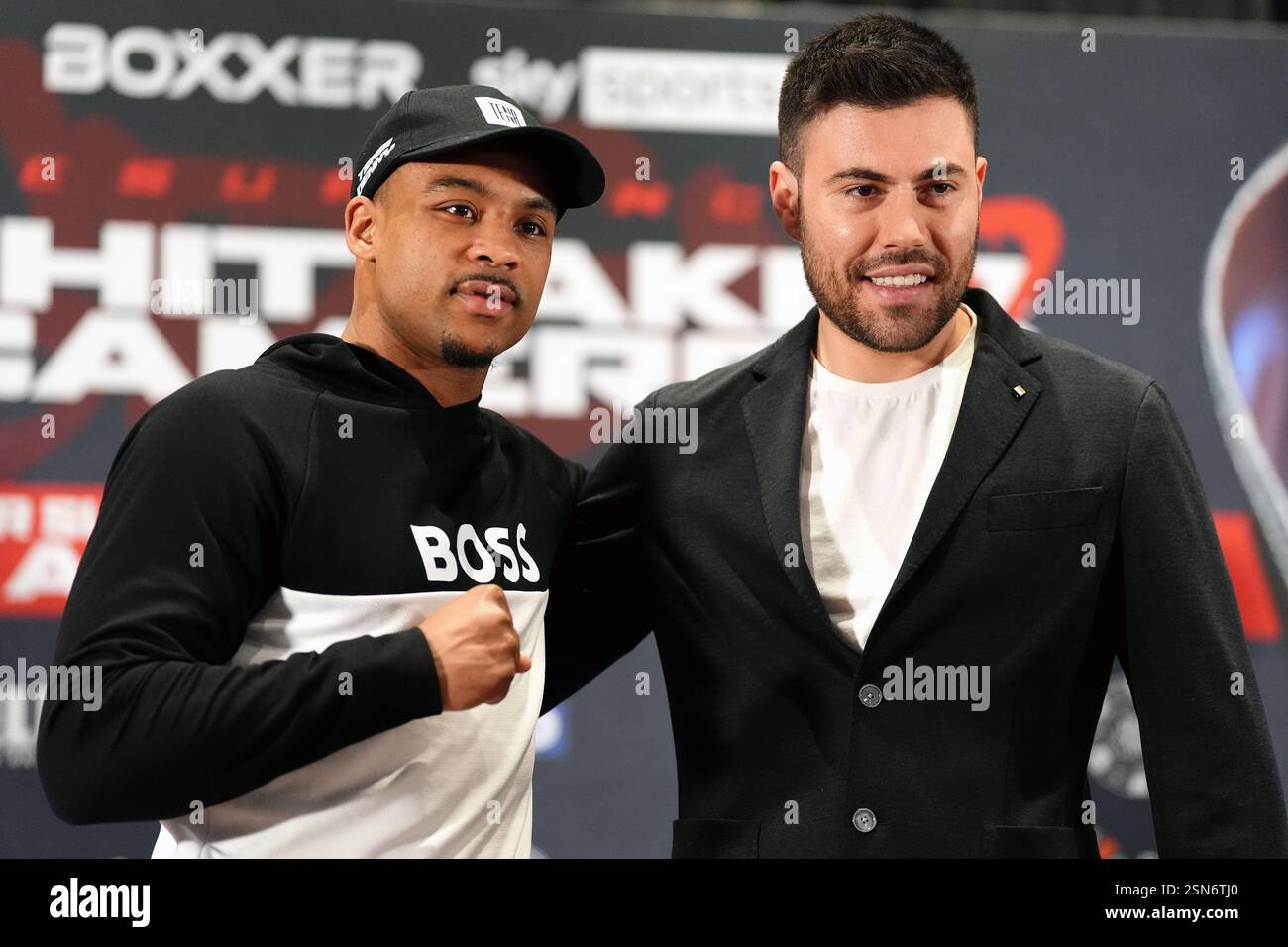 Tyler Denny with CEO of BOXXER, Ben Shalom following a press conference ...