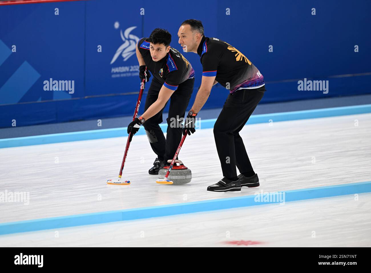 Harbin, China's Heilongjiang Province. 13th Feb, 2025. Alan Frei (R ...