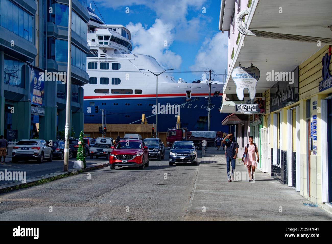 St Lucia - a street in Castries with a cruise ship as background Stock ...